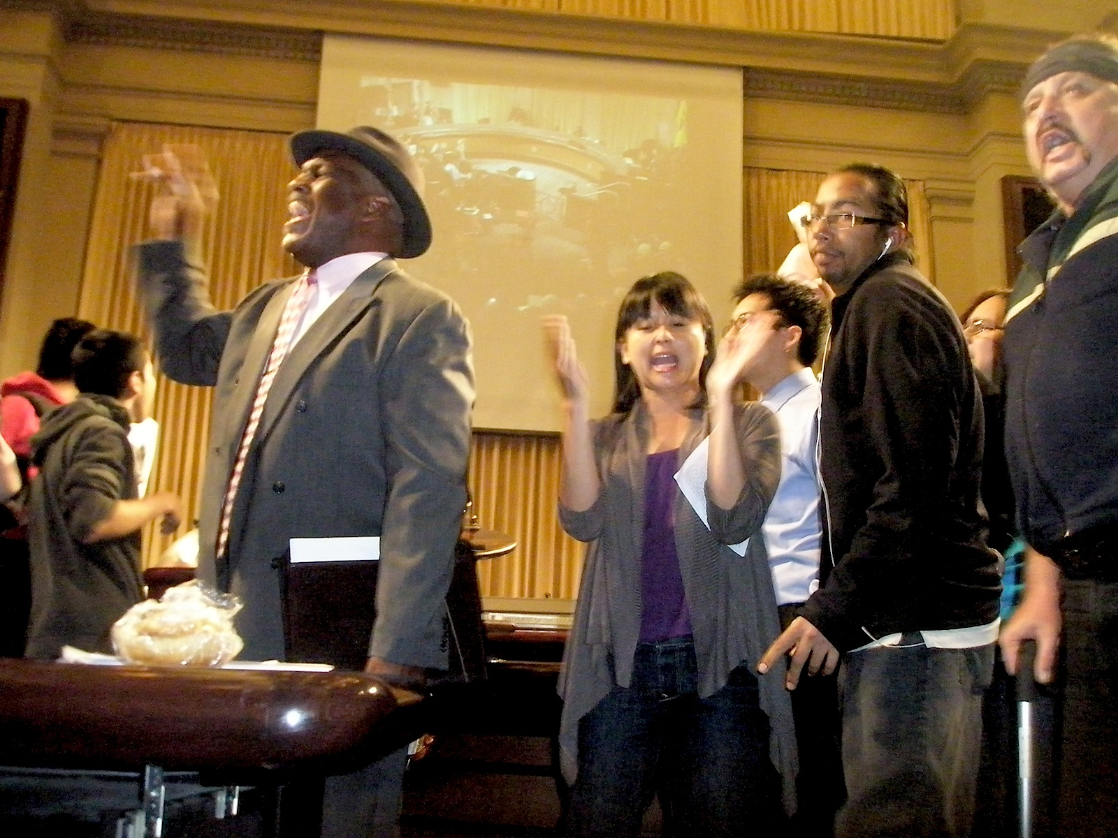 BAMN protests death of Derrick Jones at Oakland City Council meeting ...