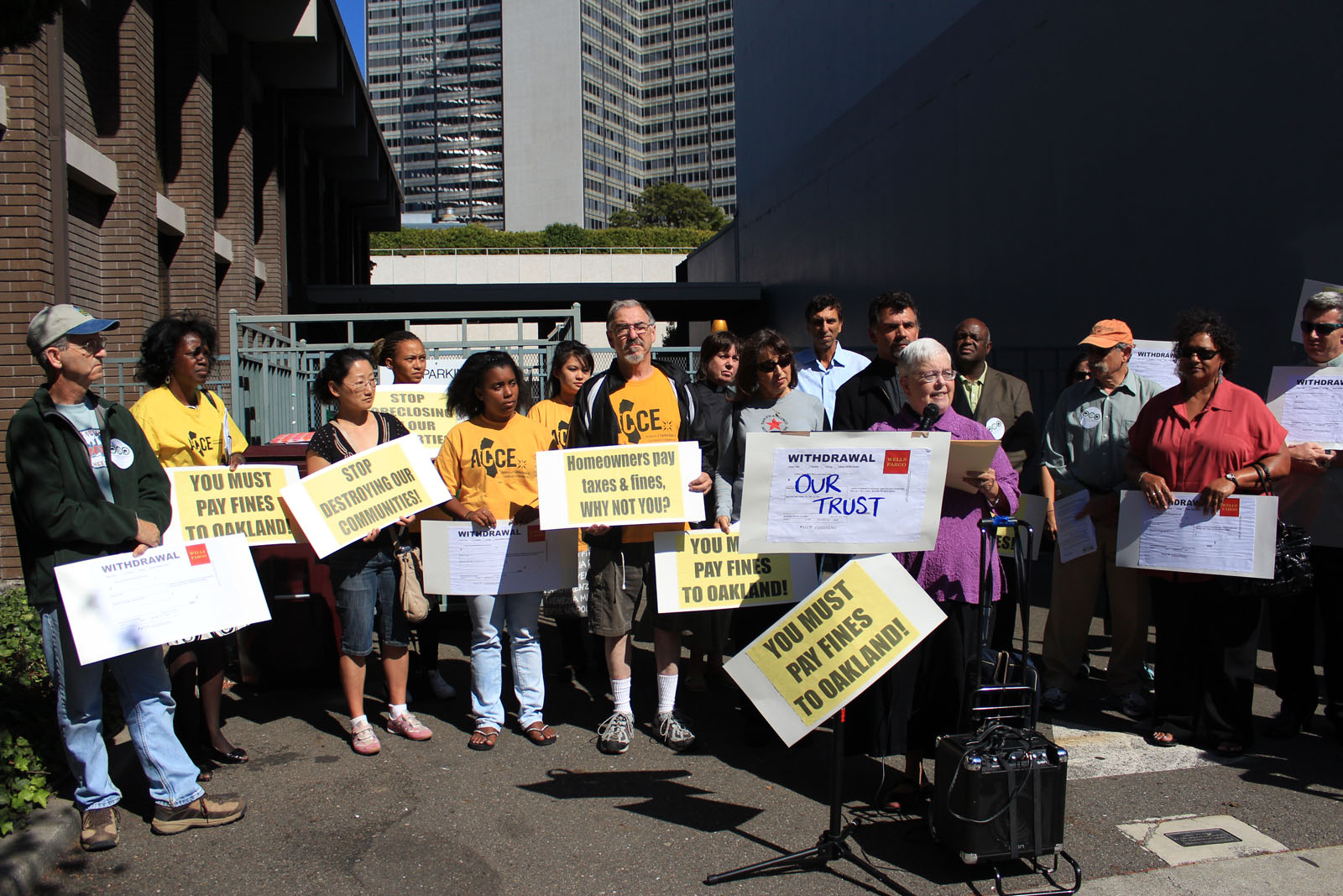 Protesters rally against Wells Fargo, close their accounts - Oakland North