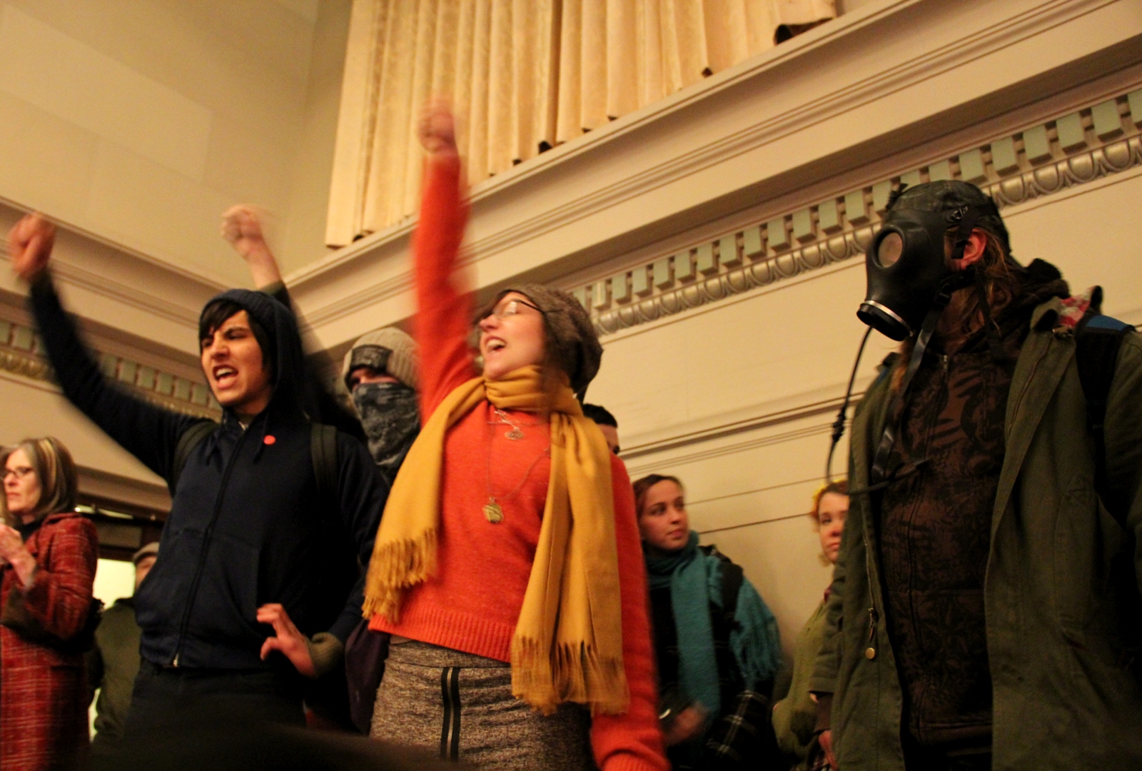 City Council discusses layoffs and department mergers, protesters ...