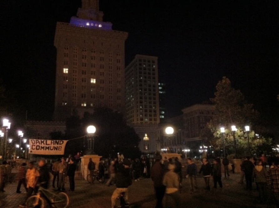 Late-night Occupy Oakland crowd marches jubilantly through city streets ...